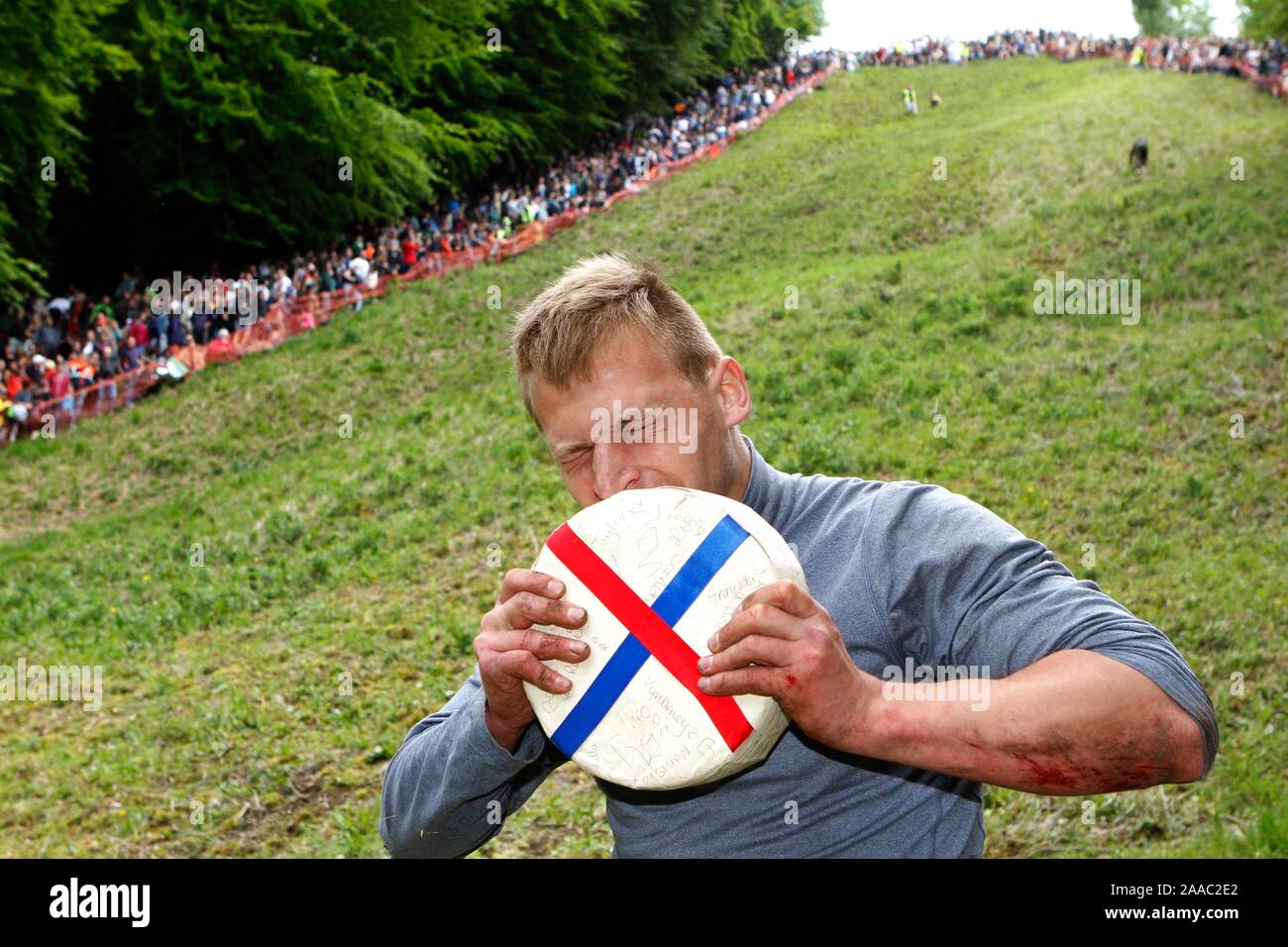 Cheese Rolling event on Cooper's Hill, near Gloucester, Gloucestershire ...
