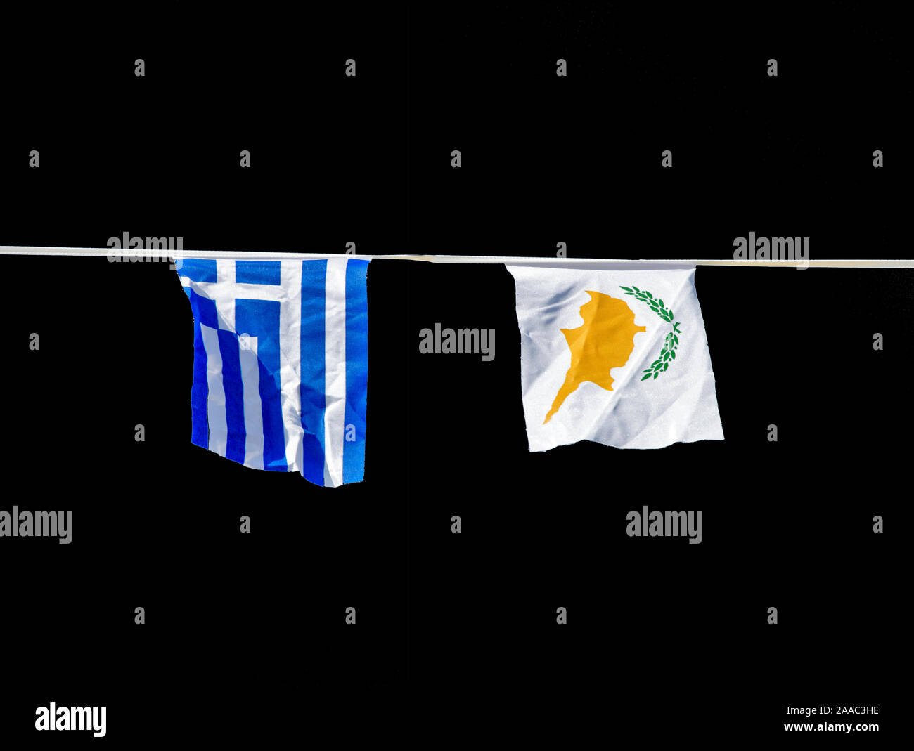 Greek an Cyprus flag isolated on black Stock Photo - Alamy