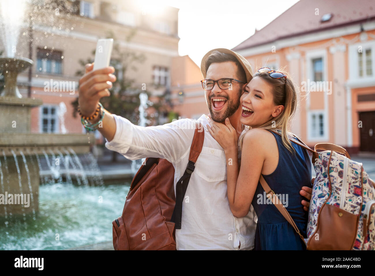 Happy tourist couple in love having fun, travel, smiling on vacation ...
