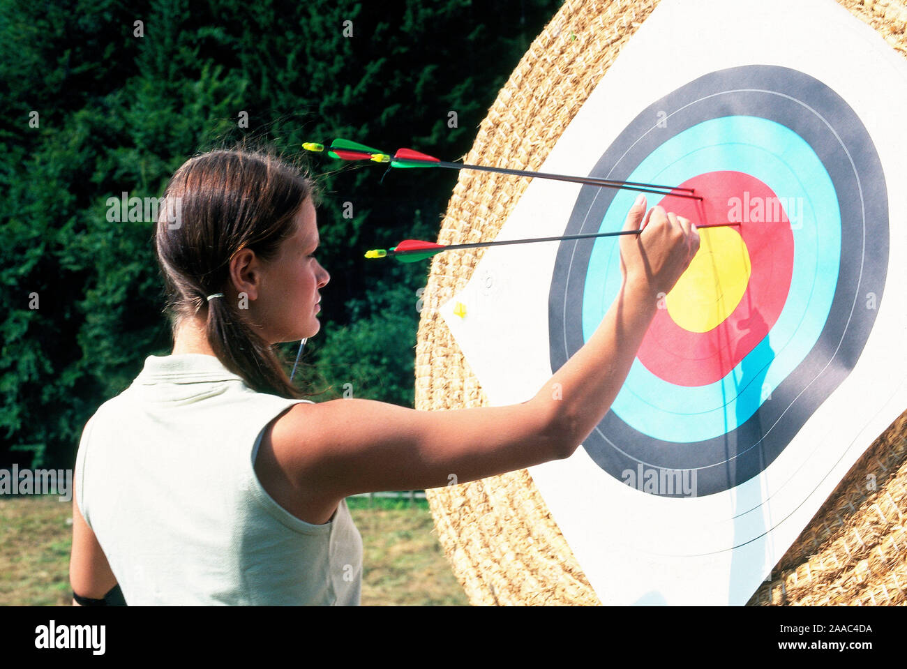 Young women archery hi-res stock photography and images - Alamy