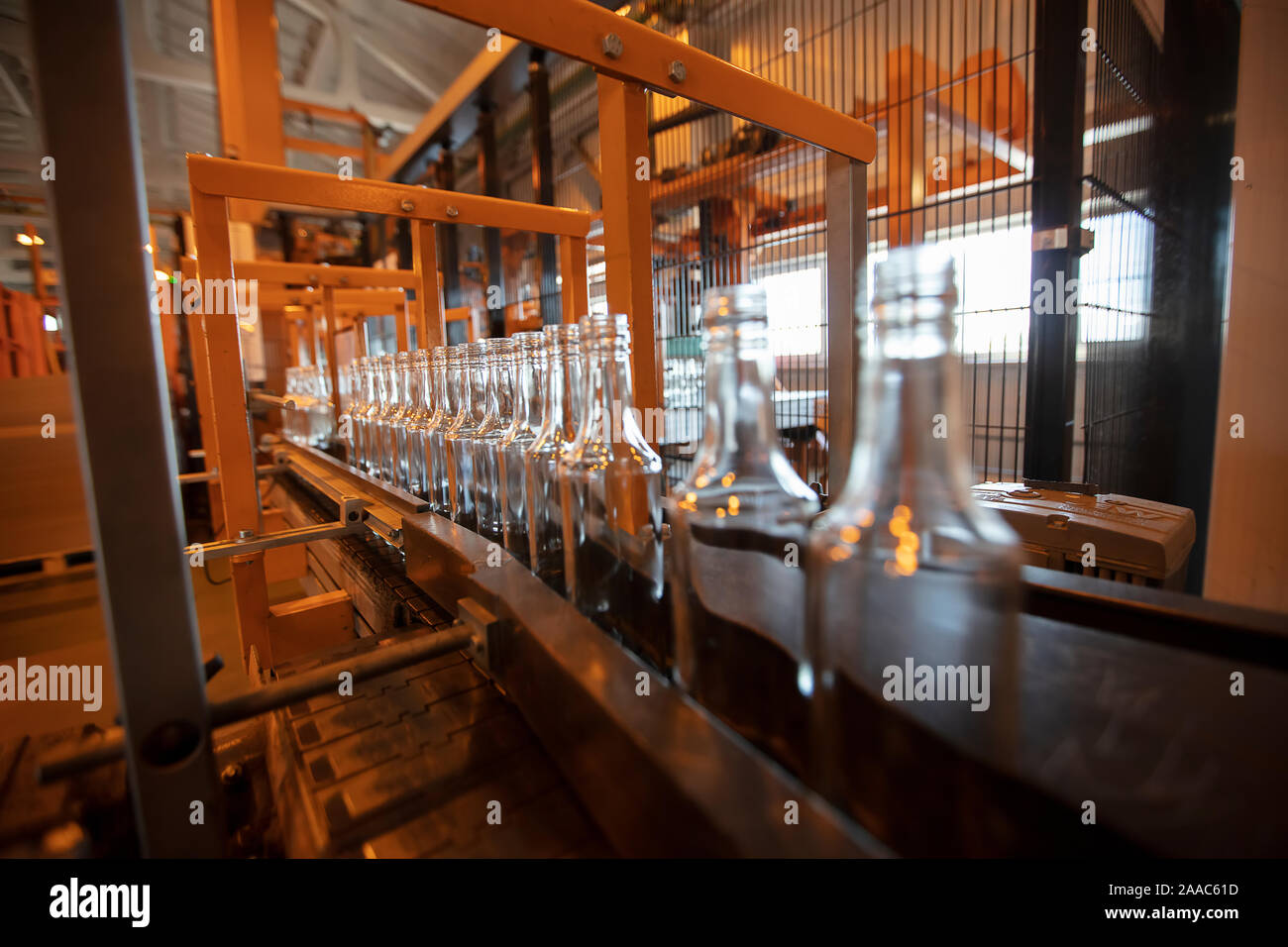 Glassworks. Glass industry. The process of making glass bottles Stock ...