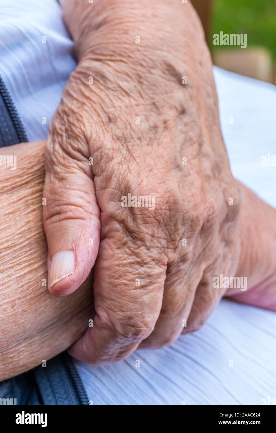 Overlapping hands hi-res stock photography and images - Alamy
