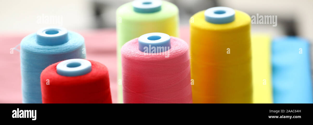 Threads for sewing on coils Stock Photo - Alamy