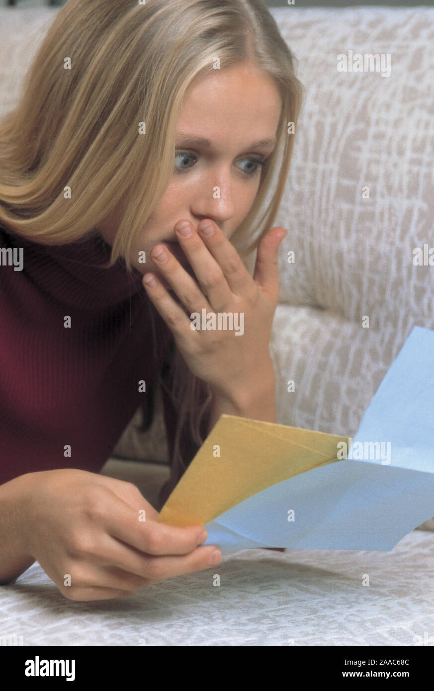 girl reading a letter Stock Photo - Alamy