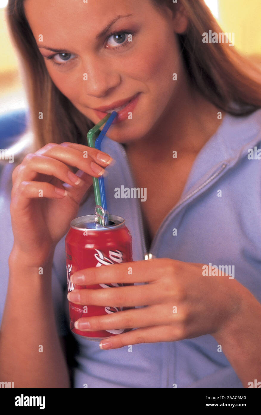 Women drinking coca cola hi-res stock photography and images - Alamy