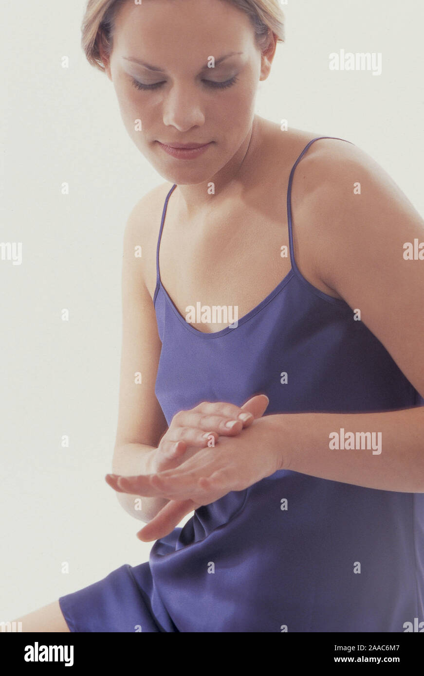 Scratching herself hi-res stock photography and images - Alamy