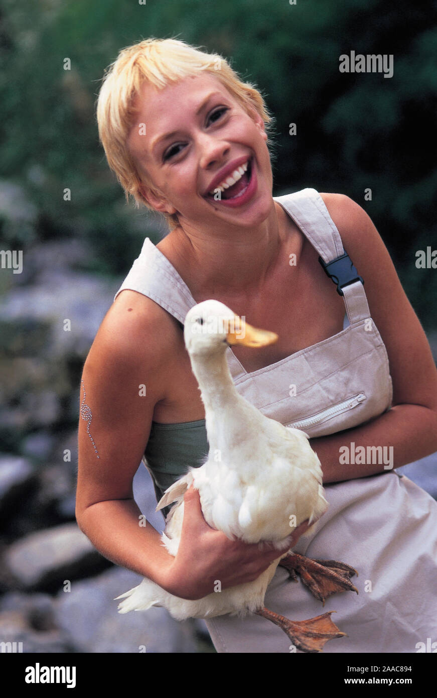 Domestic geese woman hi-res stock photography and images - Alamy