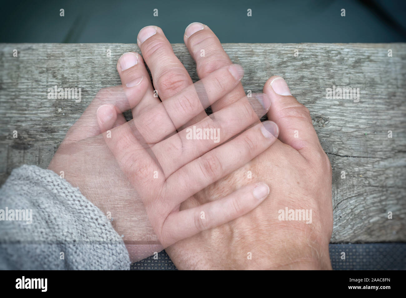 Holding a semi-transparent hand as a sign of loss of the partner Stock ...
