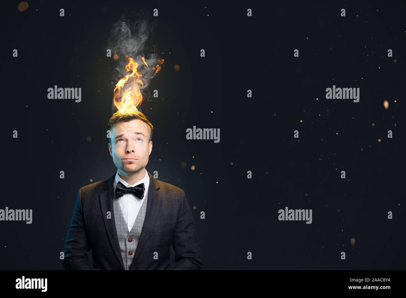 Funny portrait of a man with burning hair Stock Photo - Alamy
