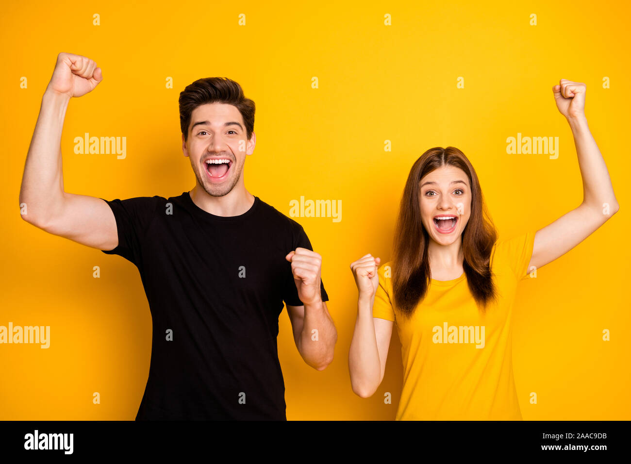 Photo of cheerful crazy excited fascinating beautiful couple rejoicing ...
