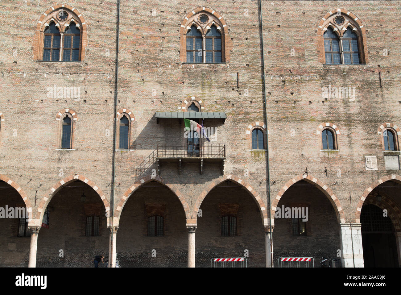 An Italian flag waves in front of the Palazzo Ducale in Mantova (Mantua ...