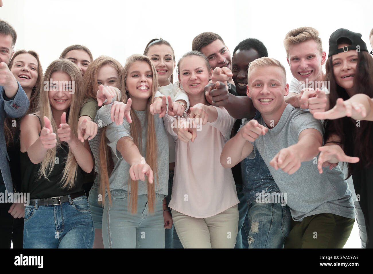 group of young like-minded people pointing at you Stock Photo - Alamy