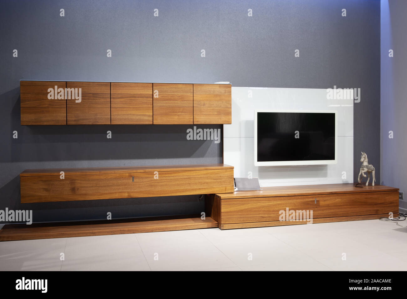 Living room large white led TV on wooden shelf. modern loft style Stock ...