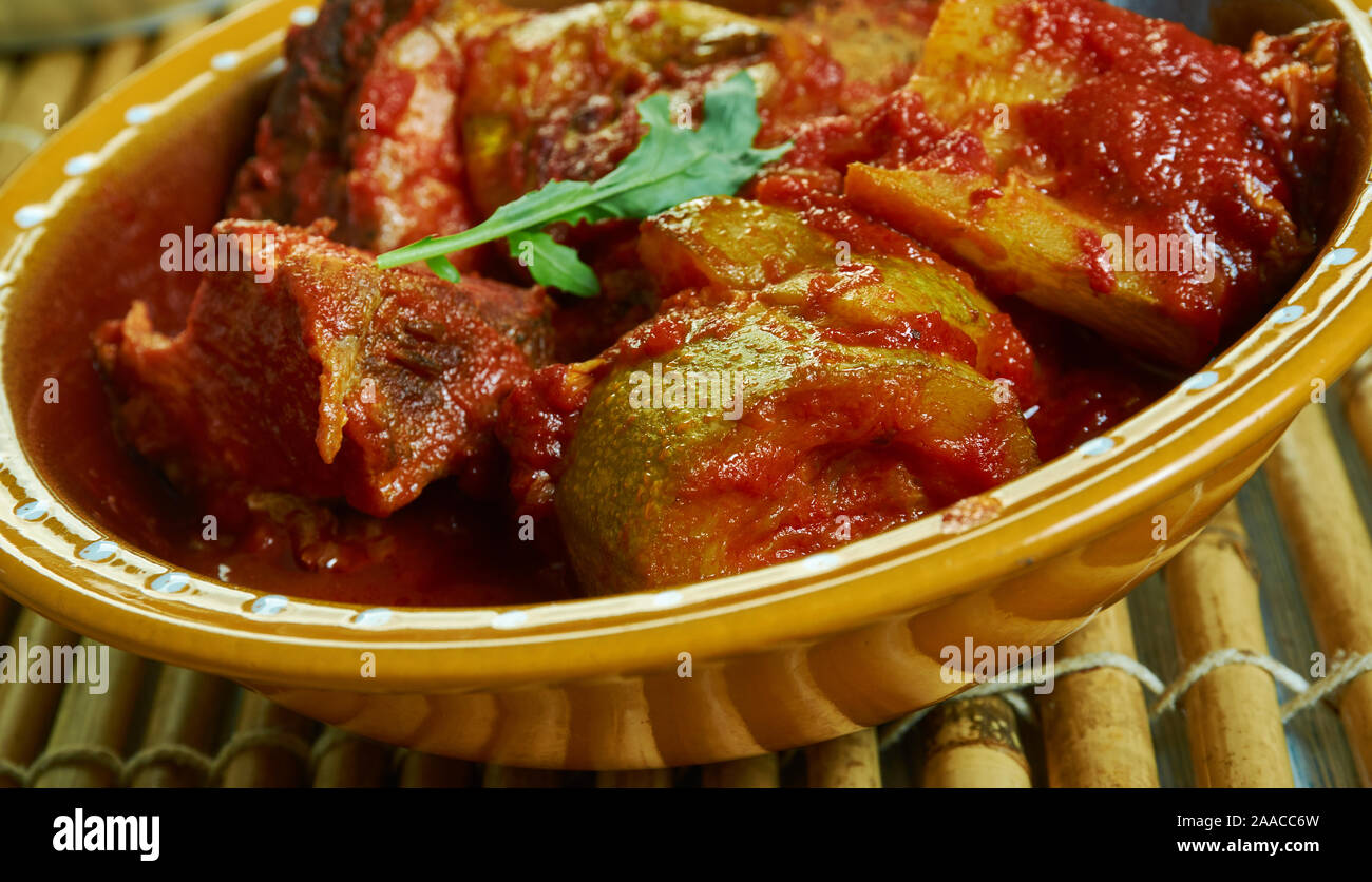 Carne de cerdo en pipian rojo, Pork in red sauce, Mexican cuisine Stock ...