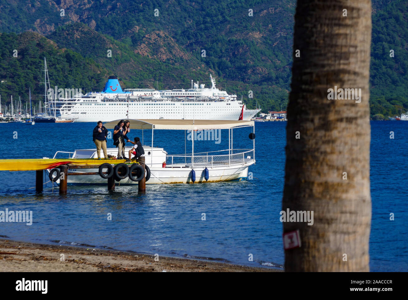 Cruise liner, boat and Beaches at Autumn in Marmaris holiday resort ...