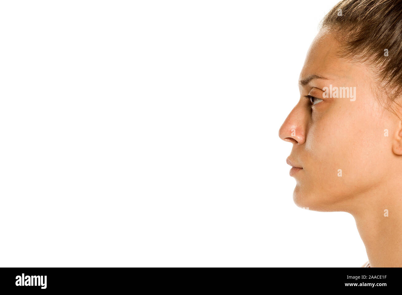Profile of young woman without makeup on white background Stock Photo ...