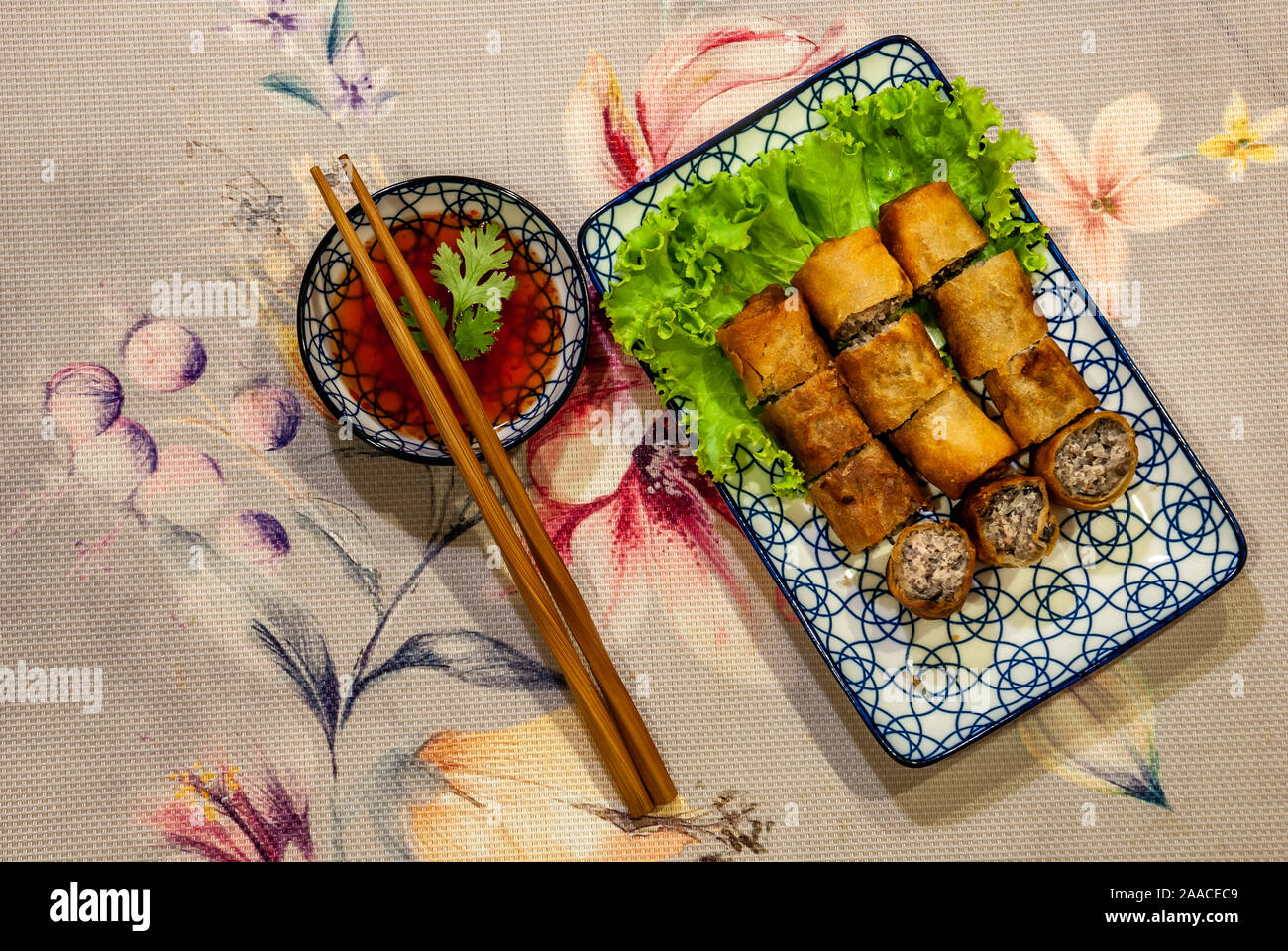 Fried traditional spring rolls food with sweet sauce in a japanese ...