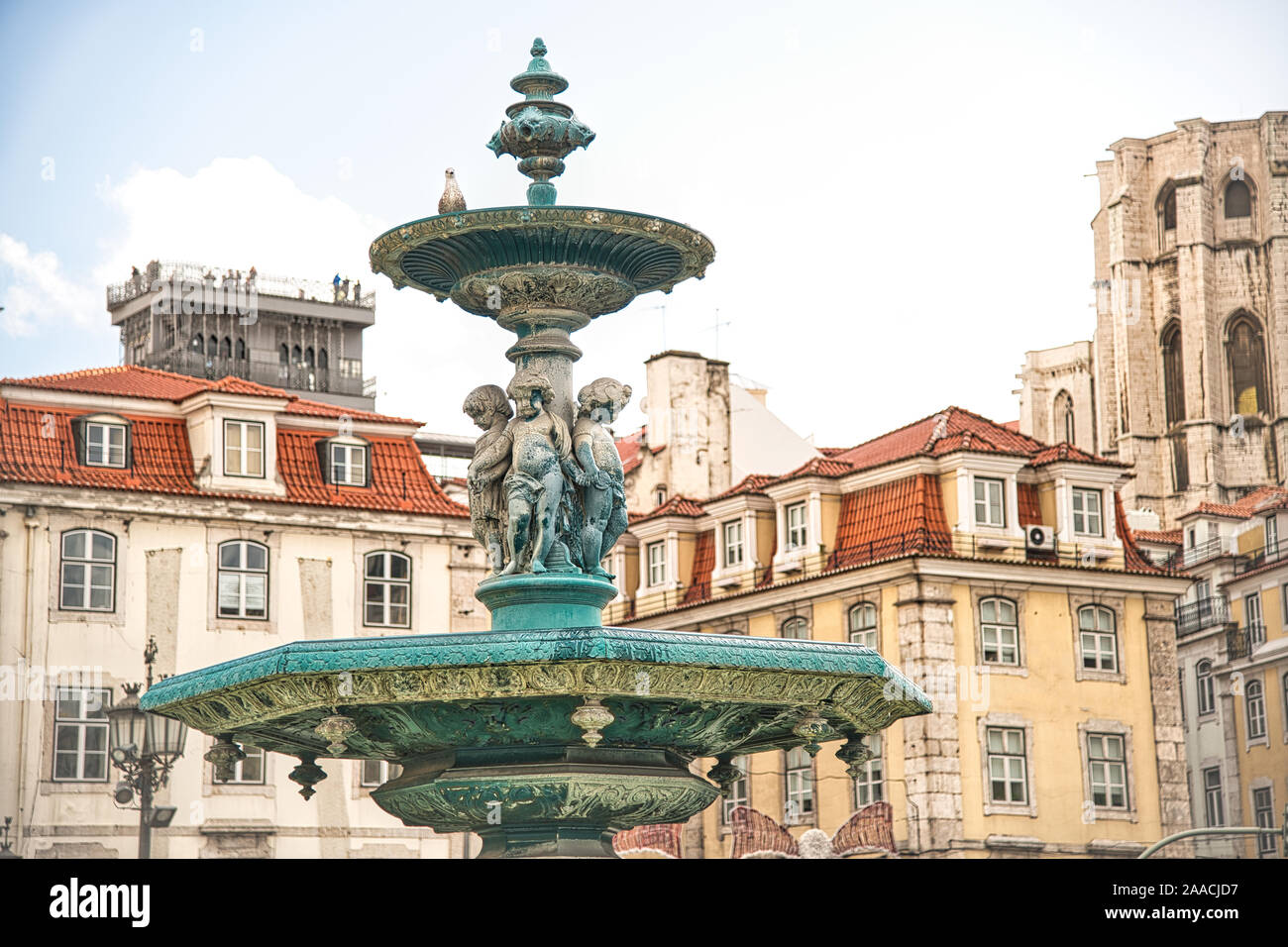 Rossio Square with fountain and sculpture, Lisbon Stock Photo - Alamy