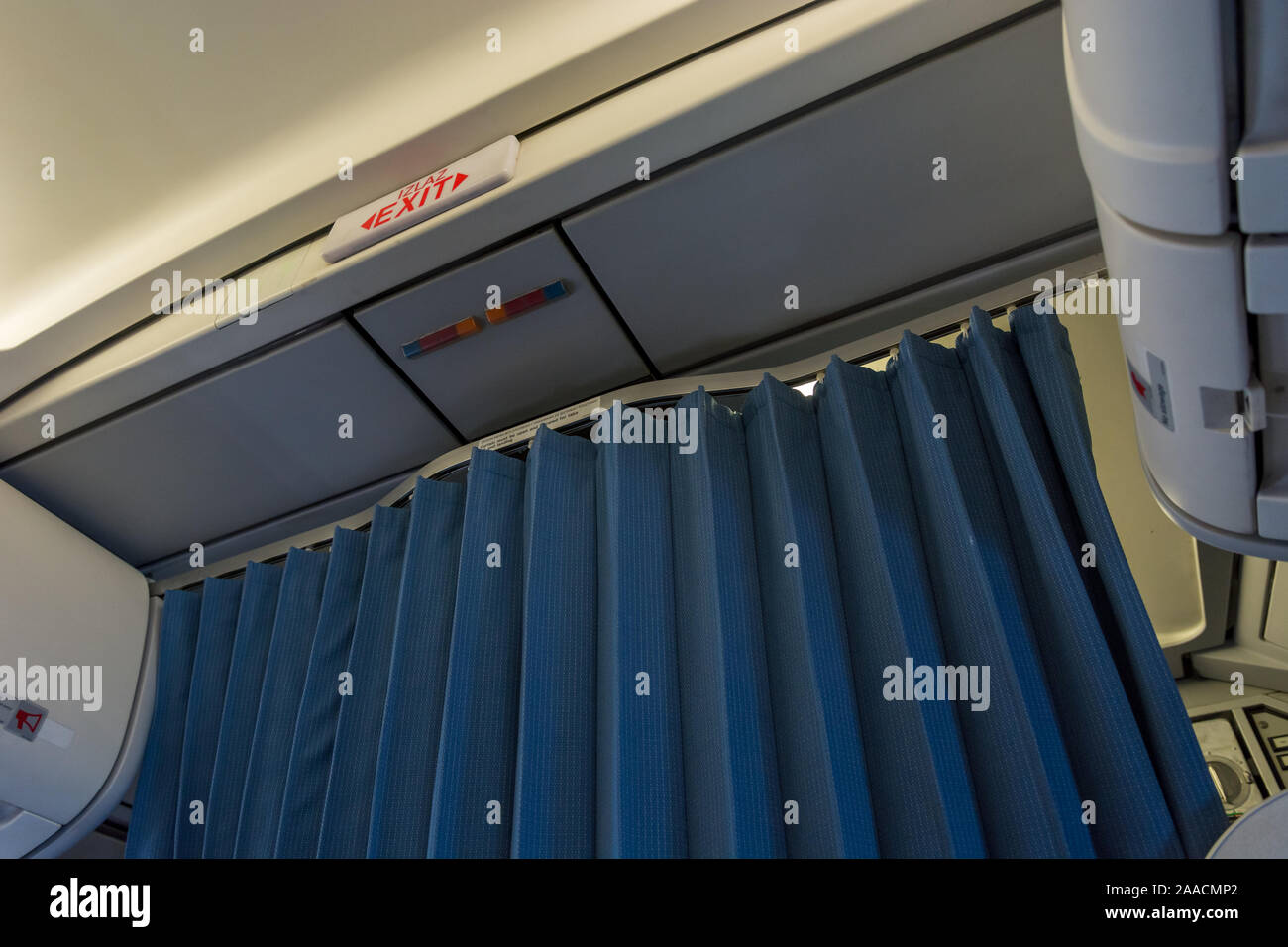 Separation curtains inside commercial flight separating cabin Stock ...