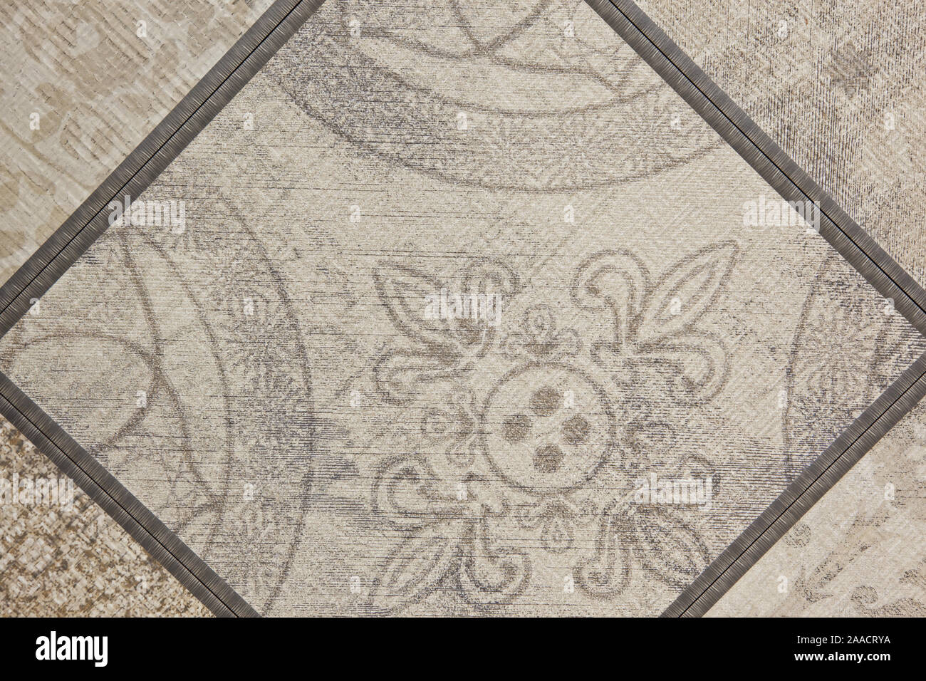 Light beige ceramic tiles with pattern on the floor Stock Photo - Alamy