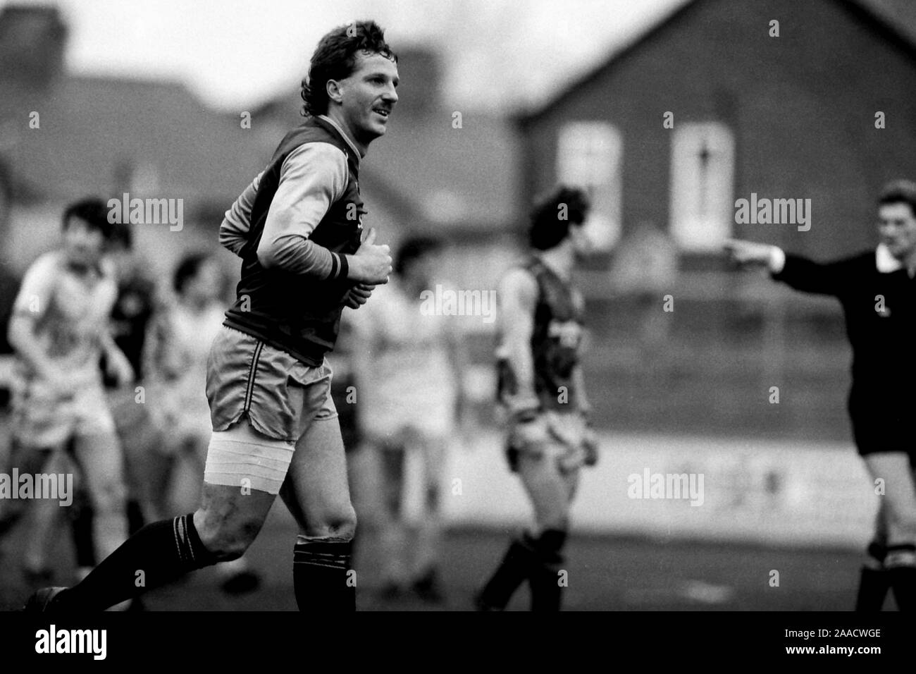 Cricketer Ian Botham playing for Scunthorpe Utd 1984 Stock Photo - Alamy