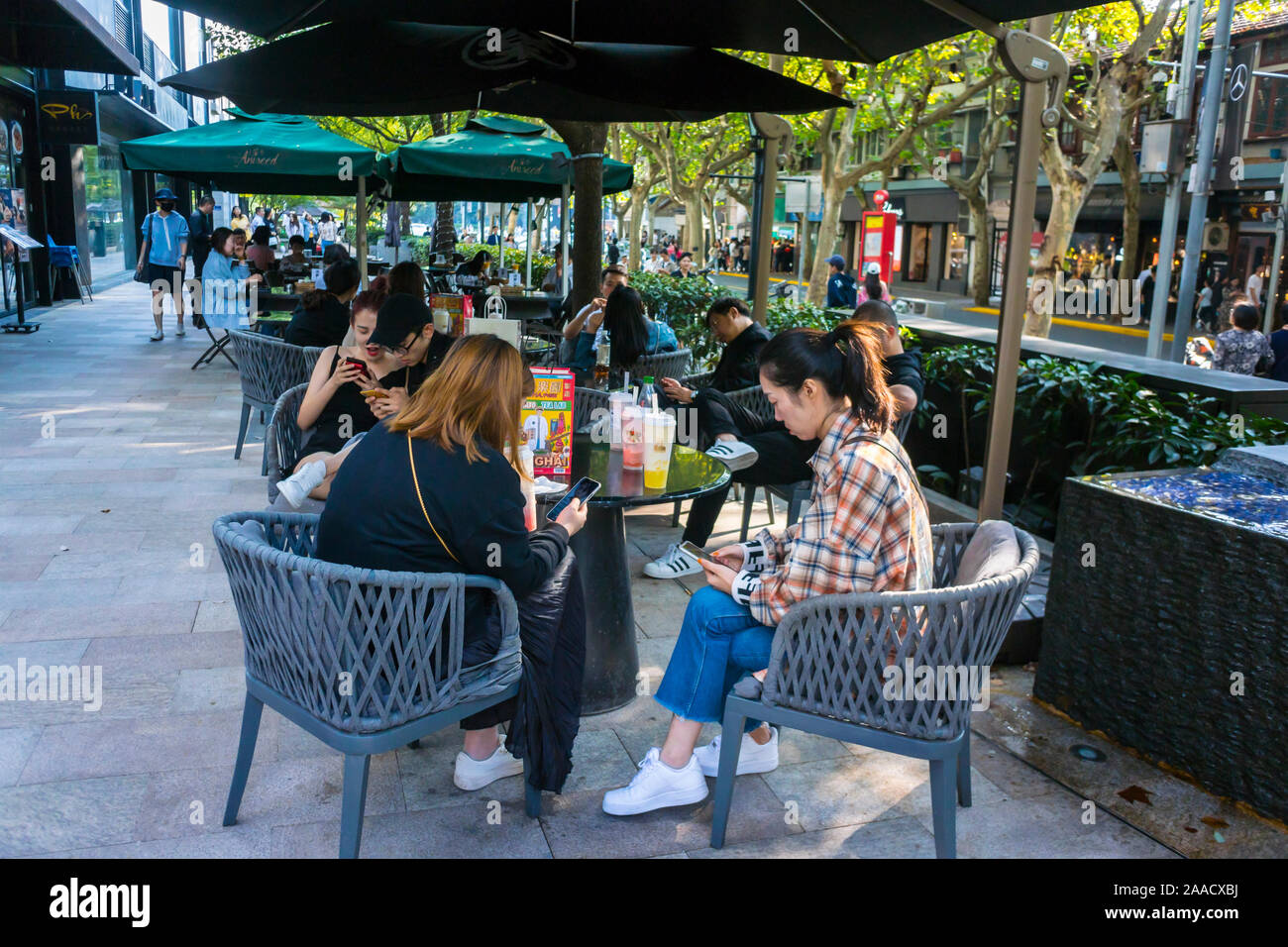 Asian teens outdoor cafe hi-res stock photography and images - Alamy