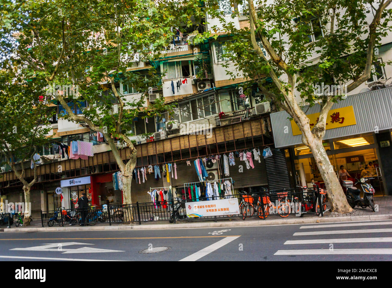 Shanghai, China, Poor Residential Housing, above Store Fronts, Street ...