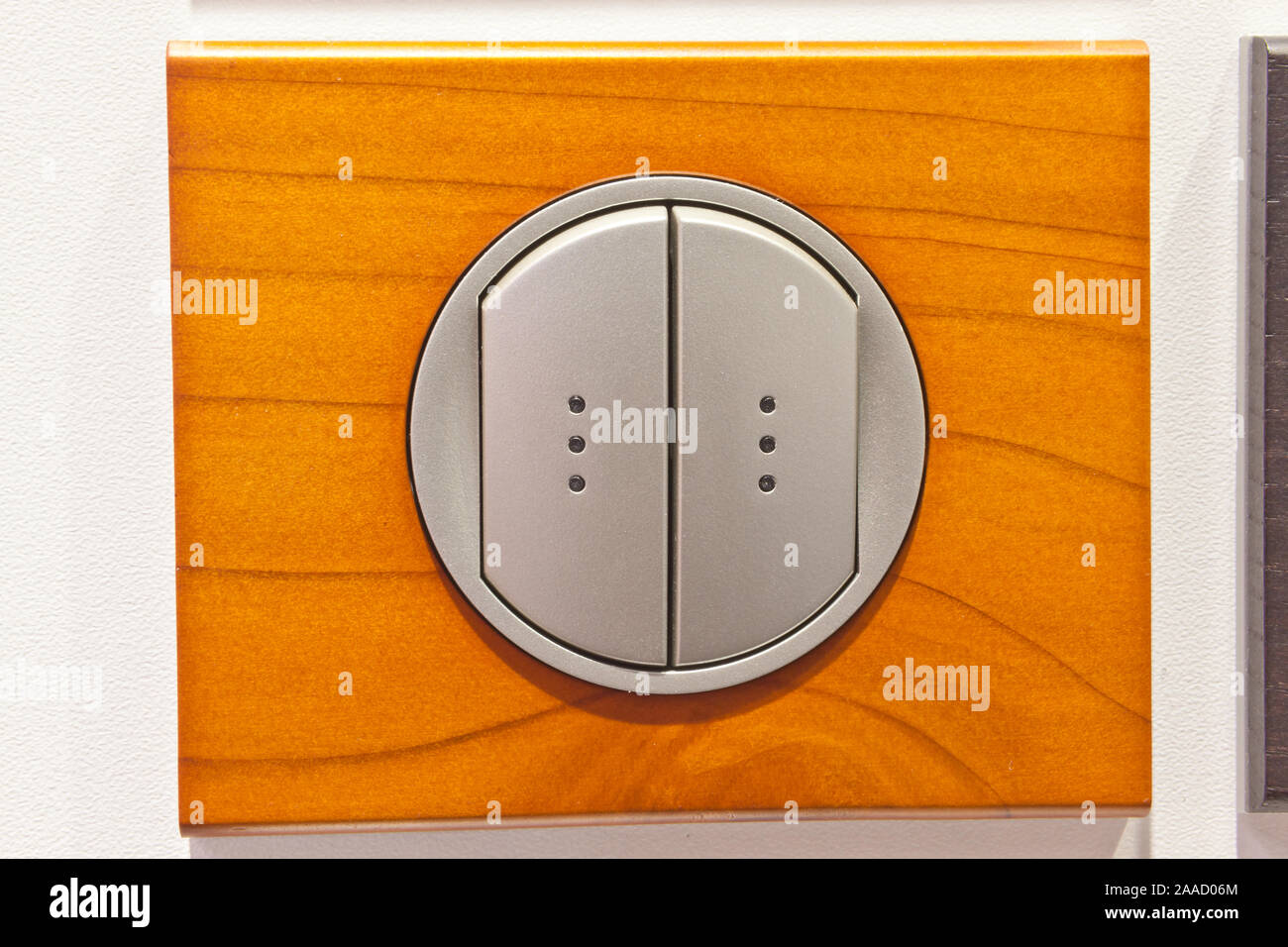 modern double electric light switch close up Stock Photo - Alamy