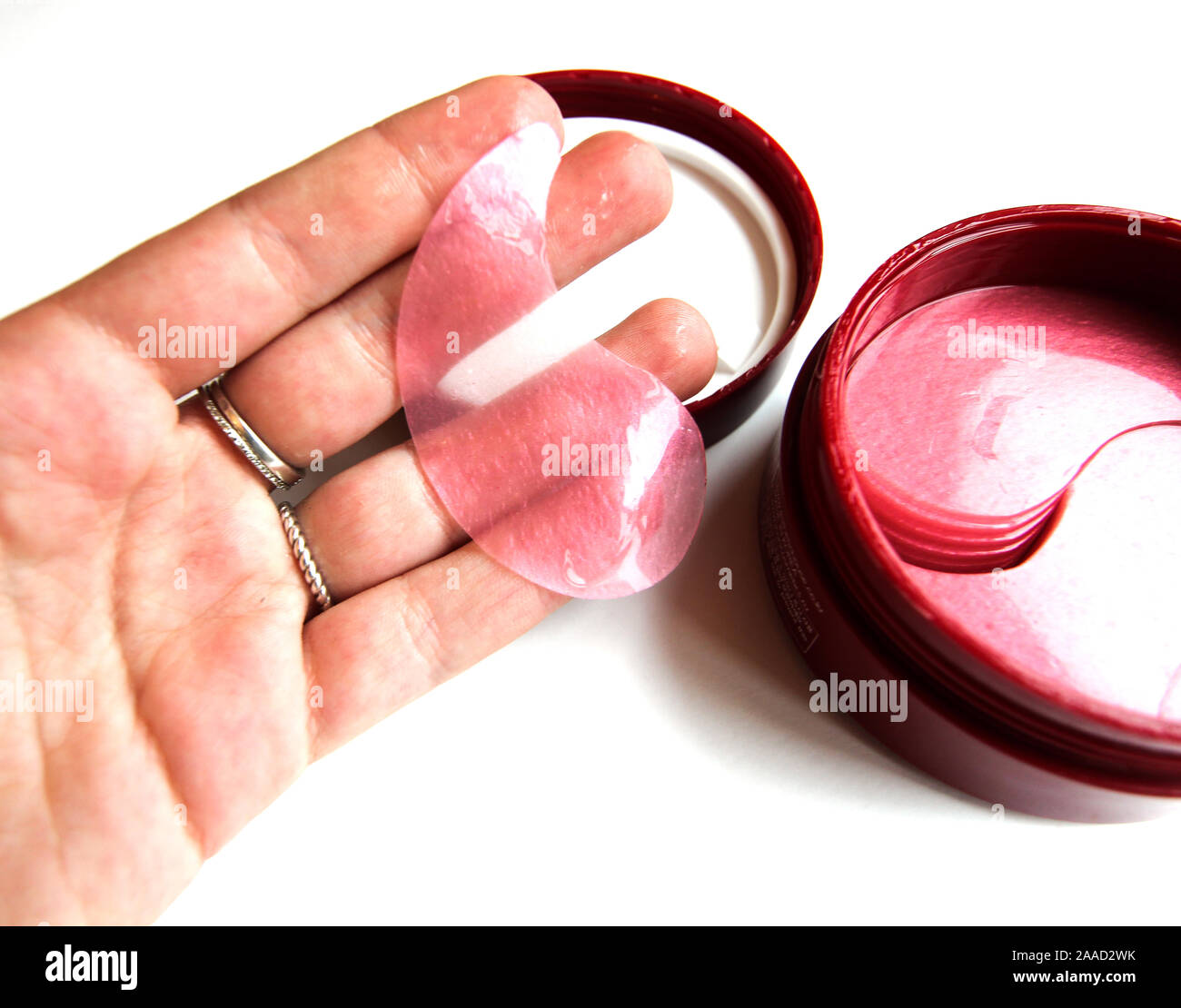 Cosmetic eye patches in a jar on a white background. Face skin care ...