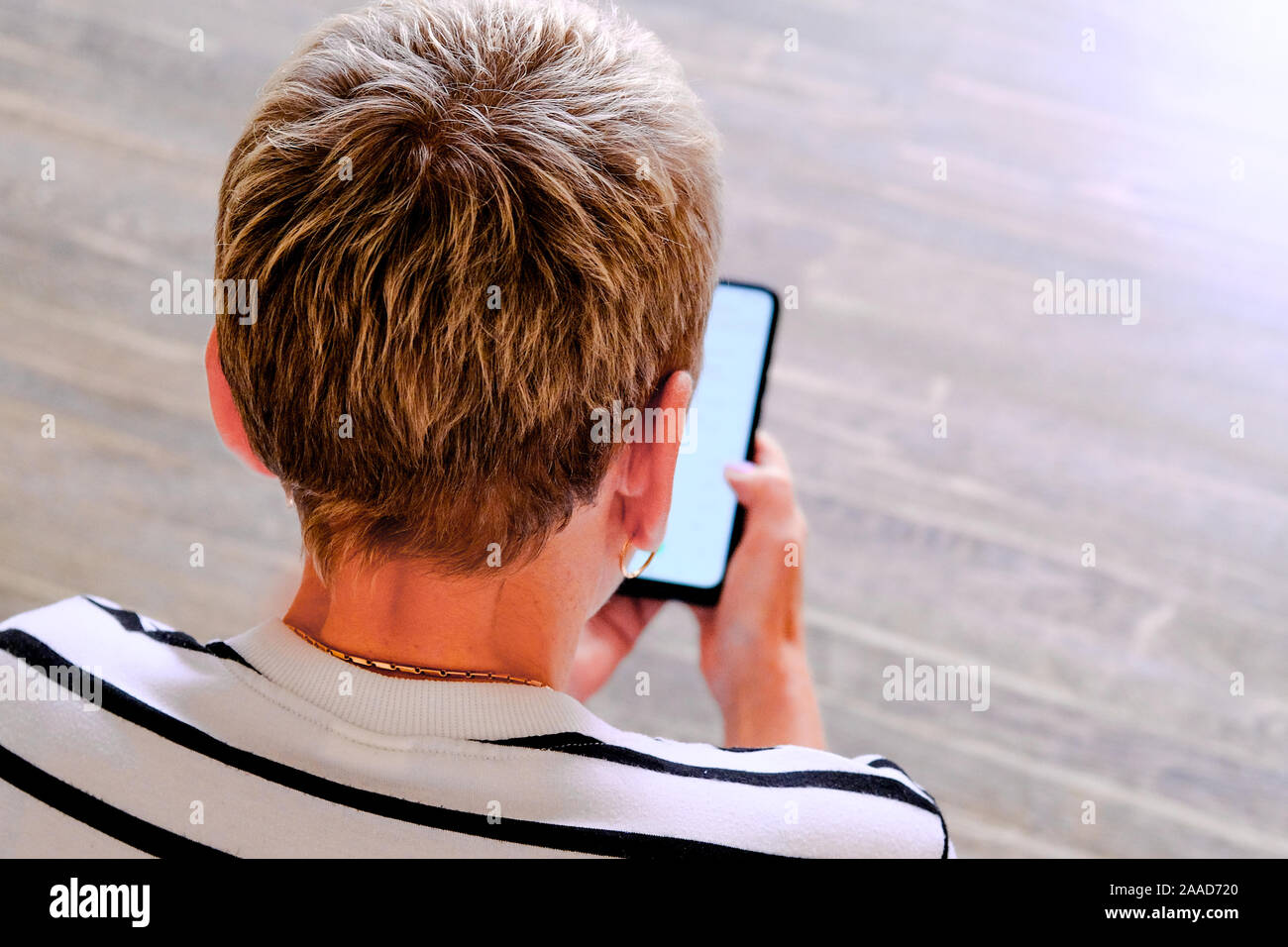 Girl talking on the phone. Unpleasant conversation. Unexpected bad news ...