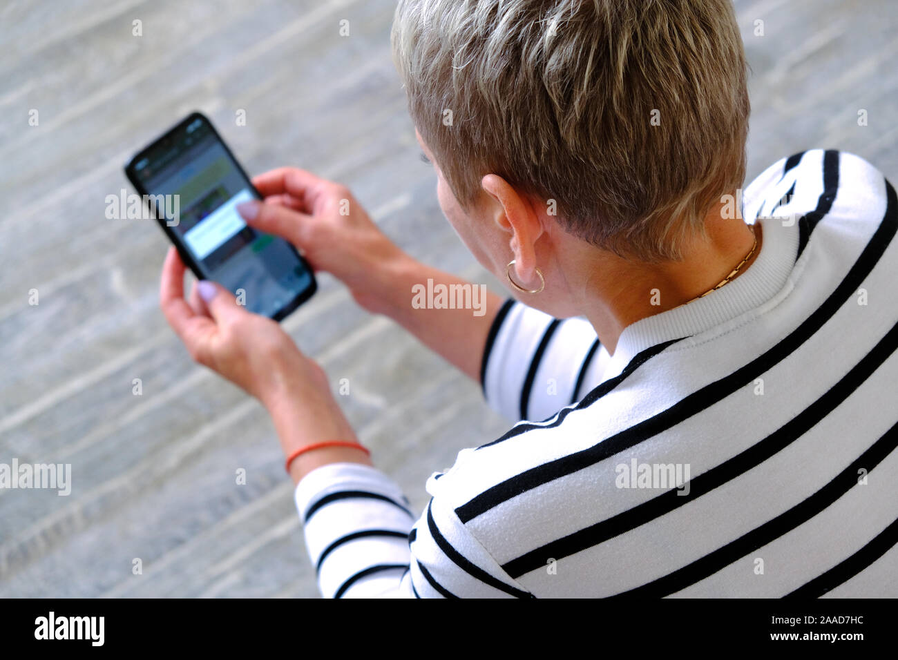 Girl talking on the phone. Unpleasant conversation. Unexpected bad news ...