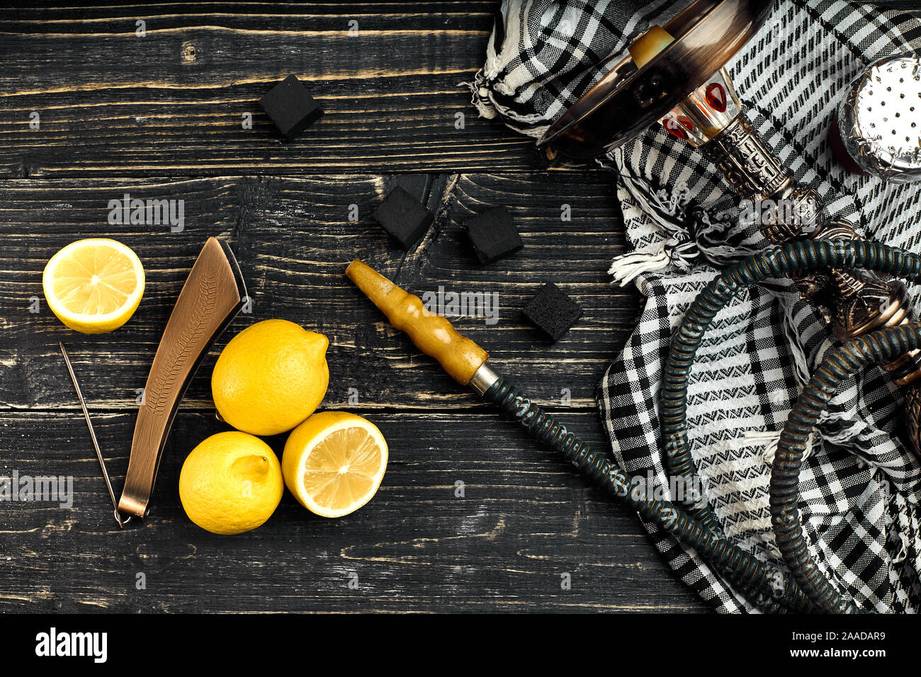 Arabic hookah with a tobacco flavor of a mixture of lemon. Top view of ...