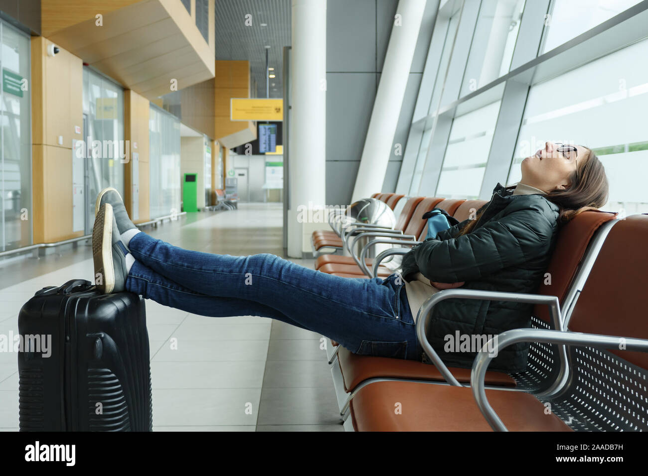 Woman Sleeping Plane High Resolution Stock Photography and Images - Alamy