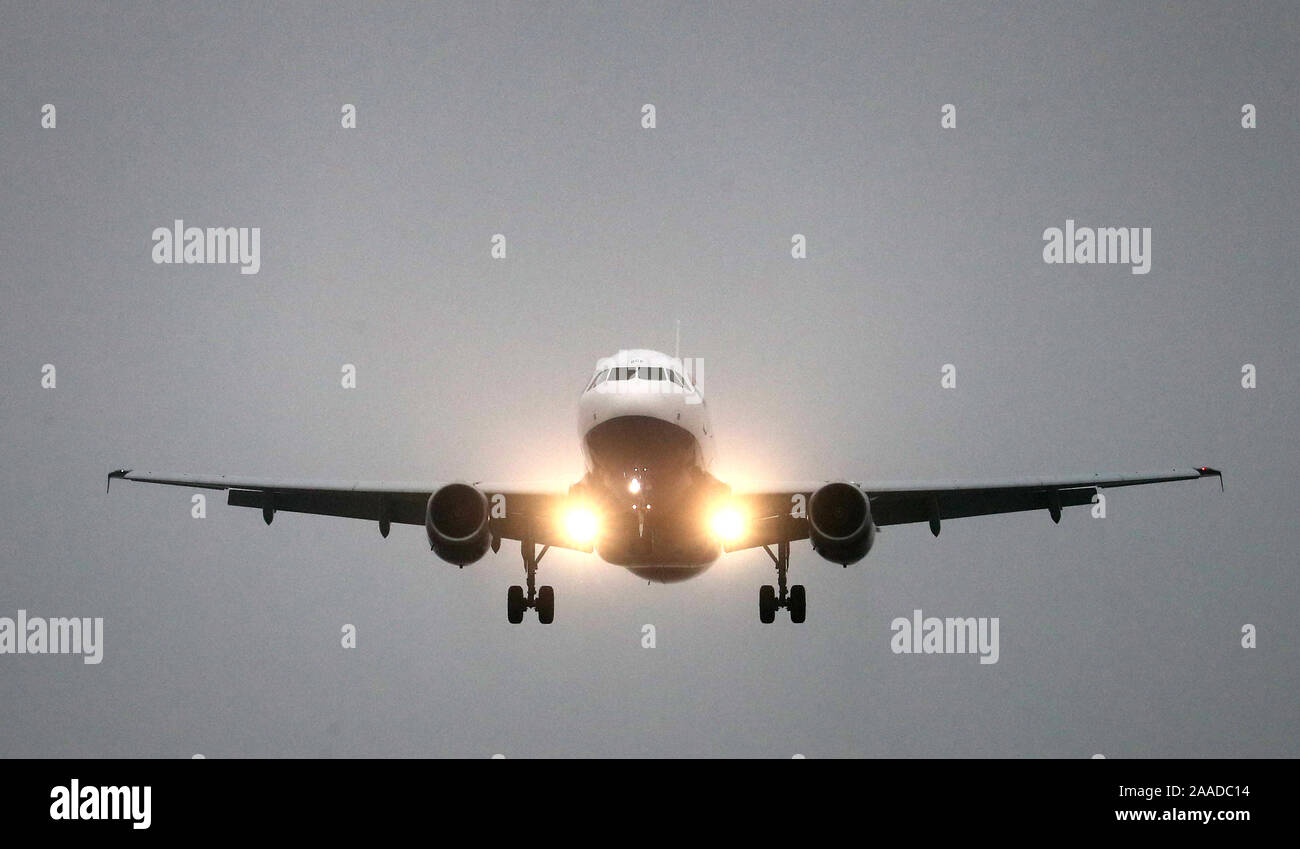 A British Airways plane lands at Gatwick Airport as thousands of BA ...
