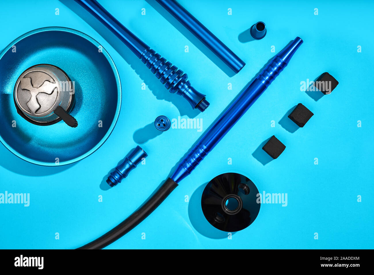 Parts of blue decorated hookah or shisha on light blue backgroun Stock ...