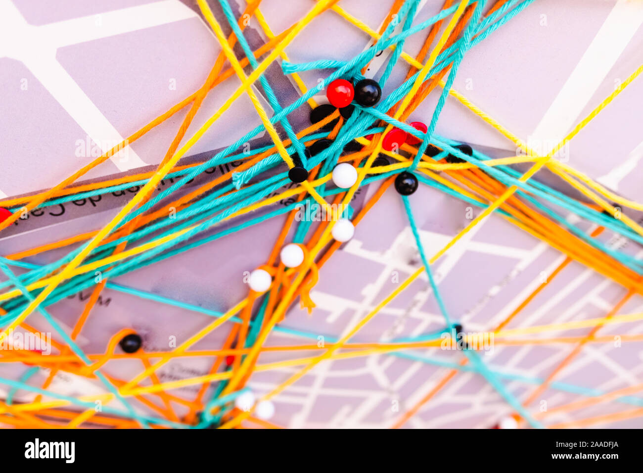 Network connections on a city map made with pins and threads Stock ...