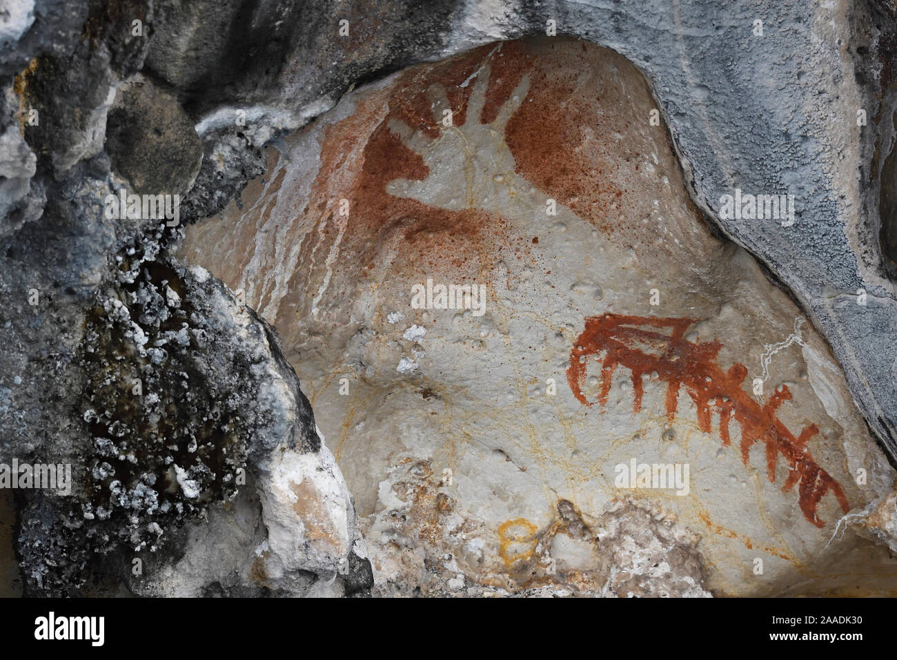 Ancient rock art paintings, from cave that caved in and exposed them to ...