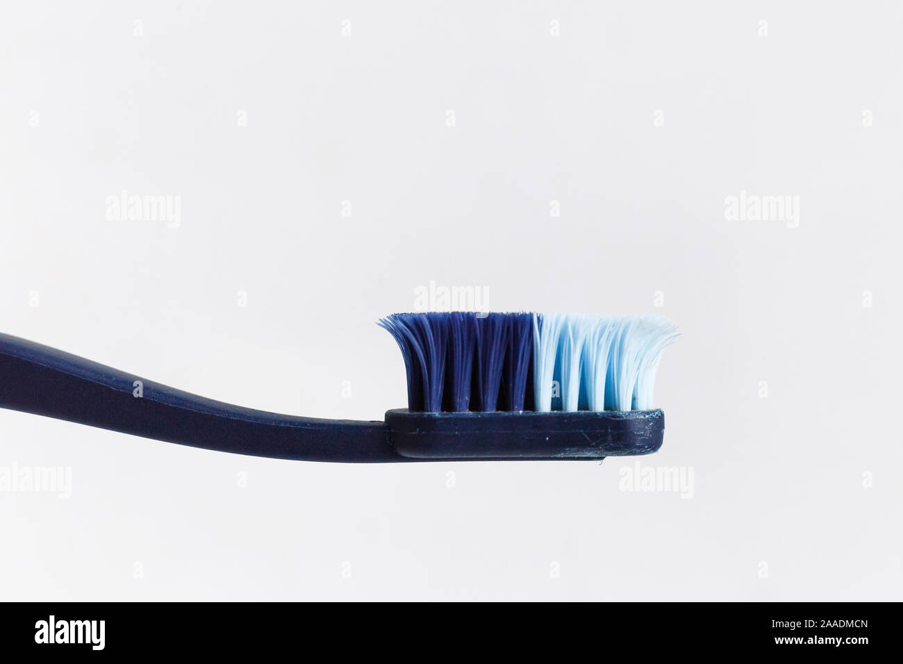 old used toothbrush on white background Stock Photo - Alamy