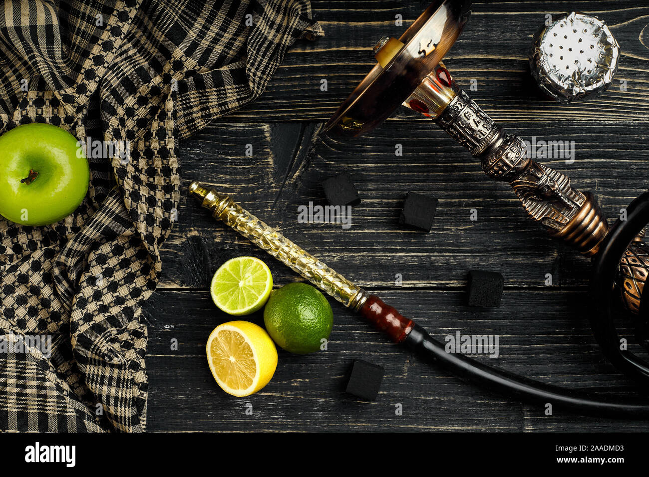 Dismantled parts of hookah on a wooden background with lime and Stock ...