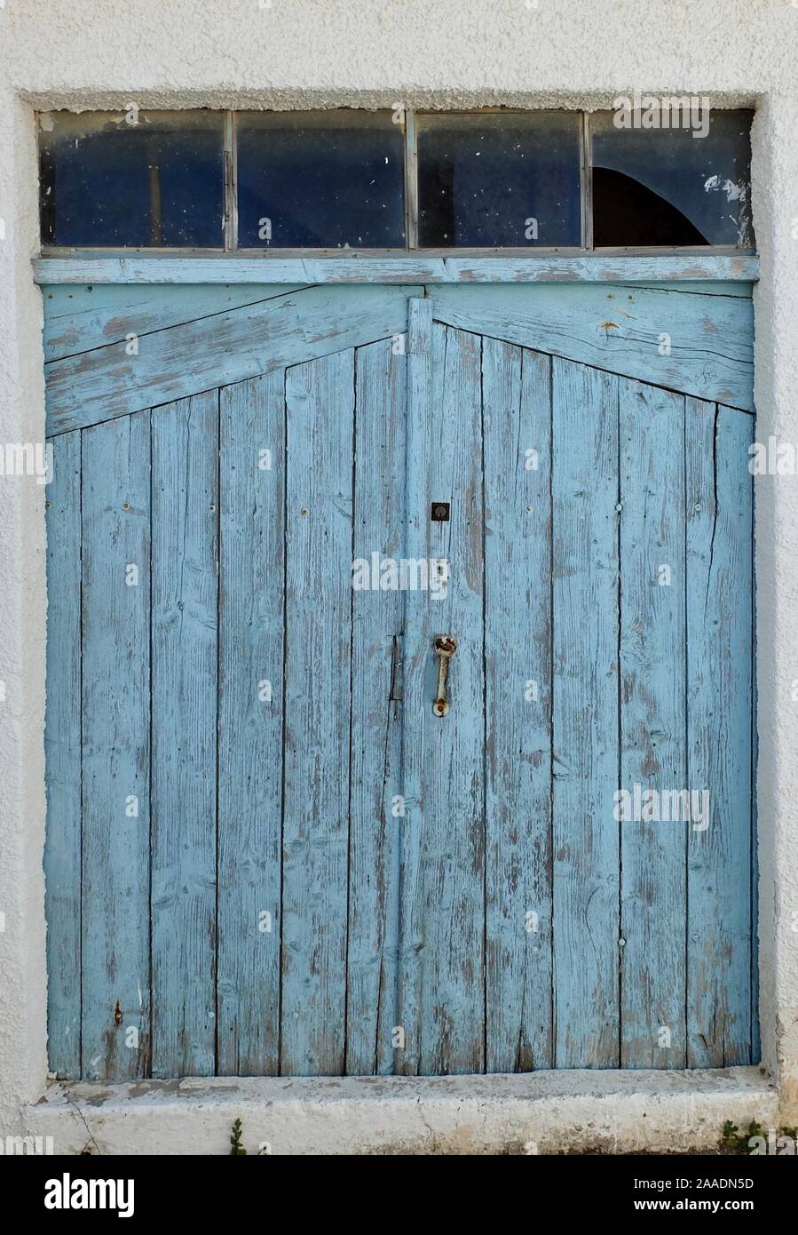 old blue window shutters with broken glass above Stock Photo - Alamy