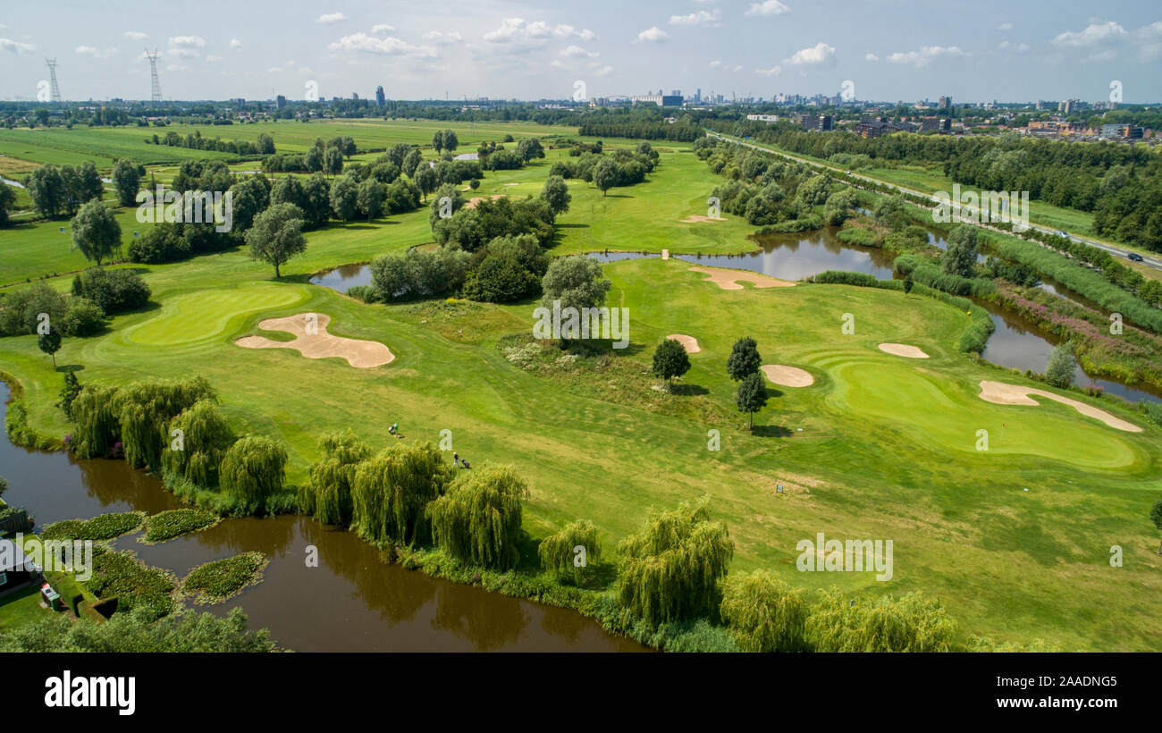 Golfcourse, Beautiful landscape of a golf court with trees and green ...