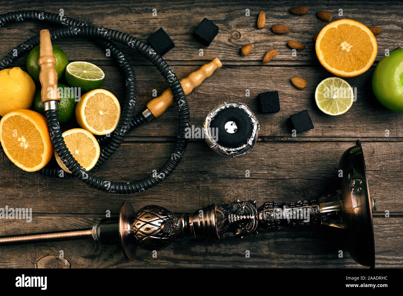 Stylish Smoking hookah and basket with lemon, lime and orange on Stock ...
