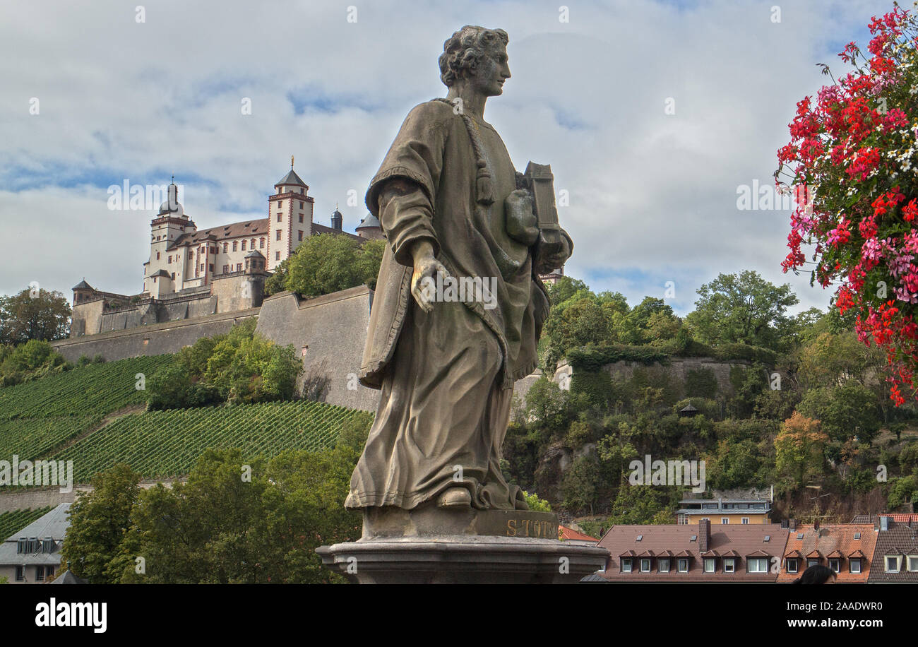 Statue of St. Totnan on Saints' Bridge across the River Main with ...