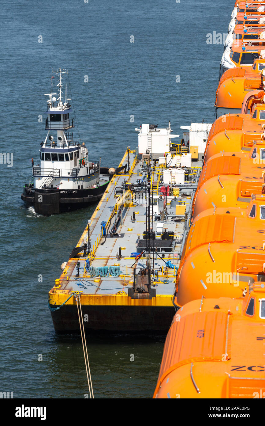 Barge providing "bunker" (fuel for ships engines) to The RMS Queen Mary ...