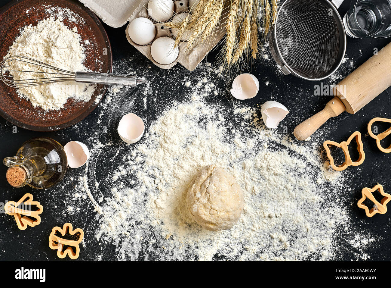 Cooking dough for cookies, butter, eggs, cooking equipment, flour on a ...