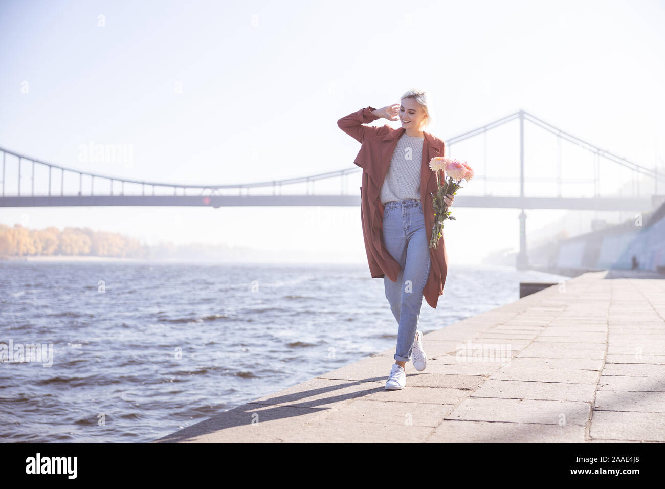 Woman enjoying morning sun hi-res stock photography and images - Alamy