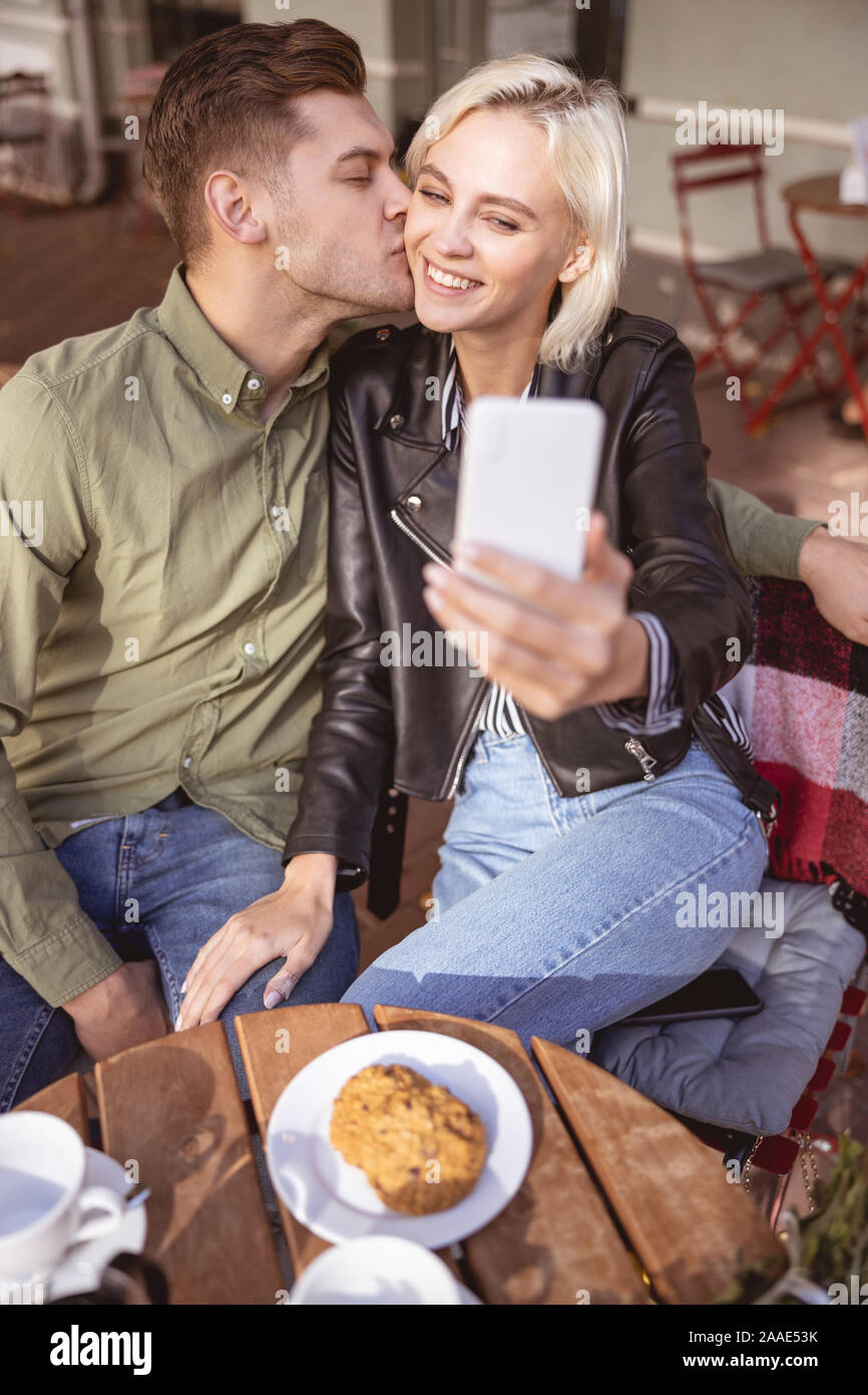 Pretty woman being glad dating her boyfriend Stock Photo - Alamy