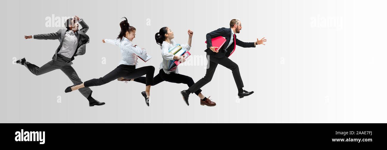Happy office workers jumping and dancing in casual clothes or suit with ...