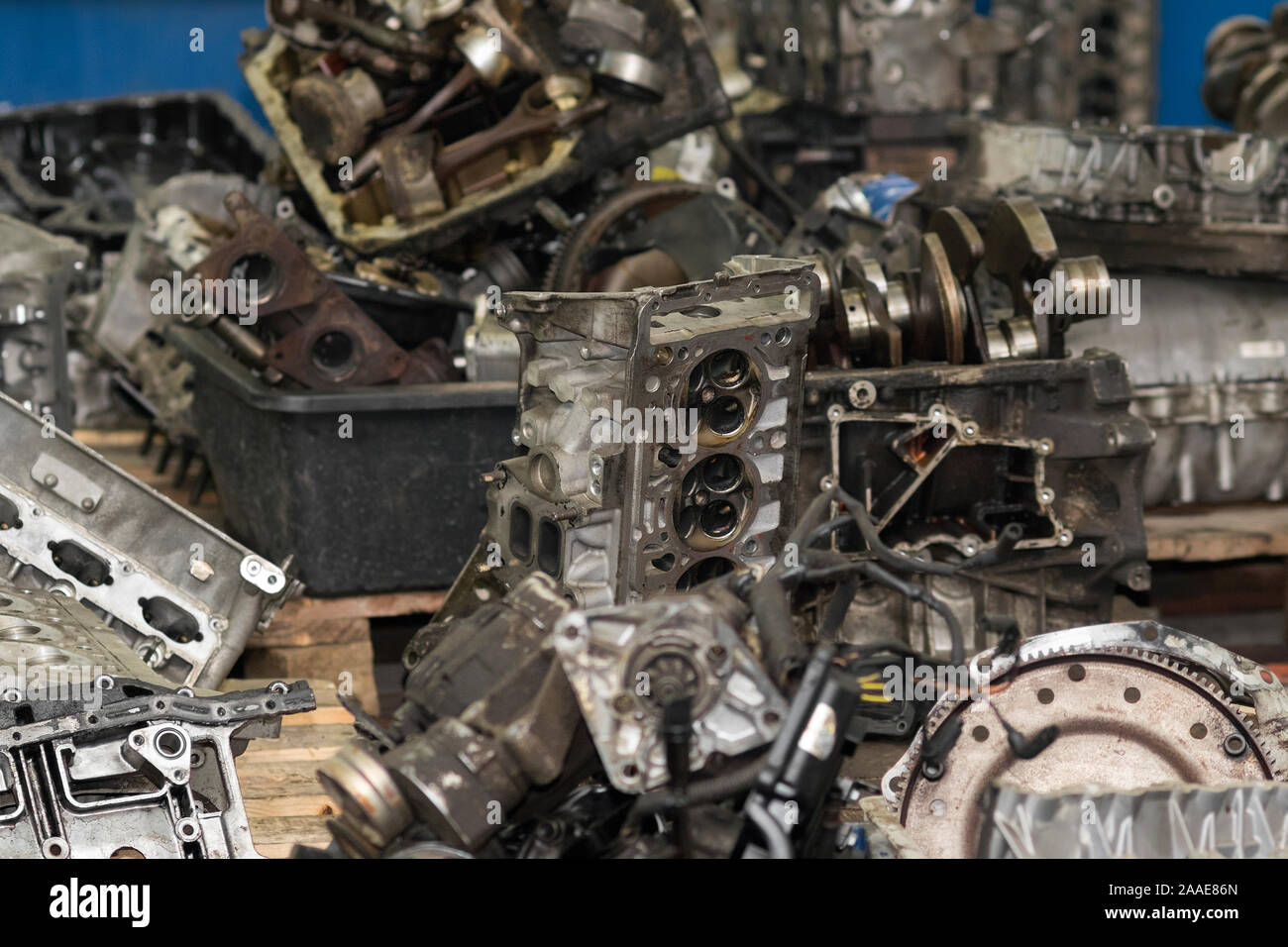 Stack of used car engines in mess, indoor close-up Stock Photo - Alamy