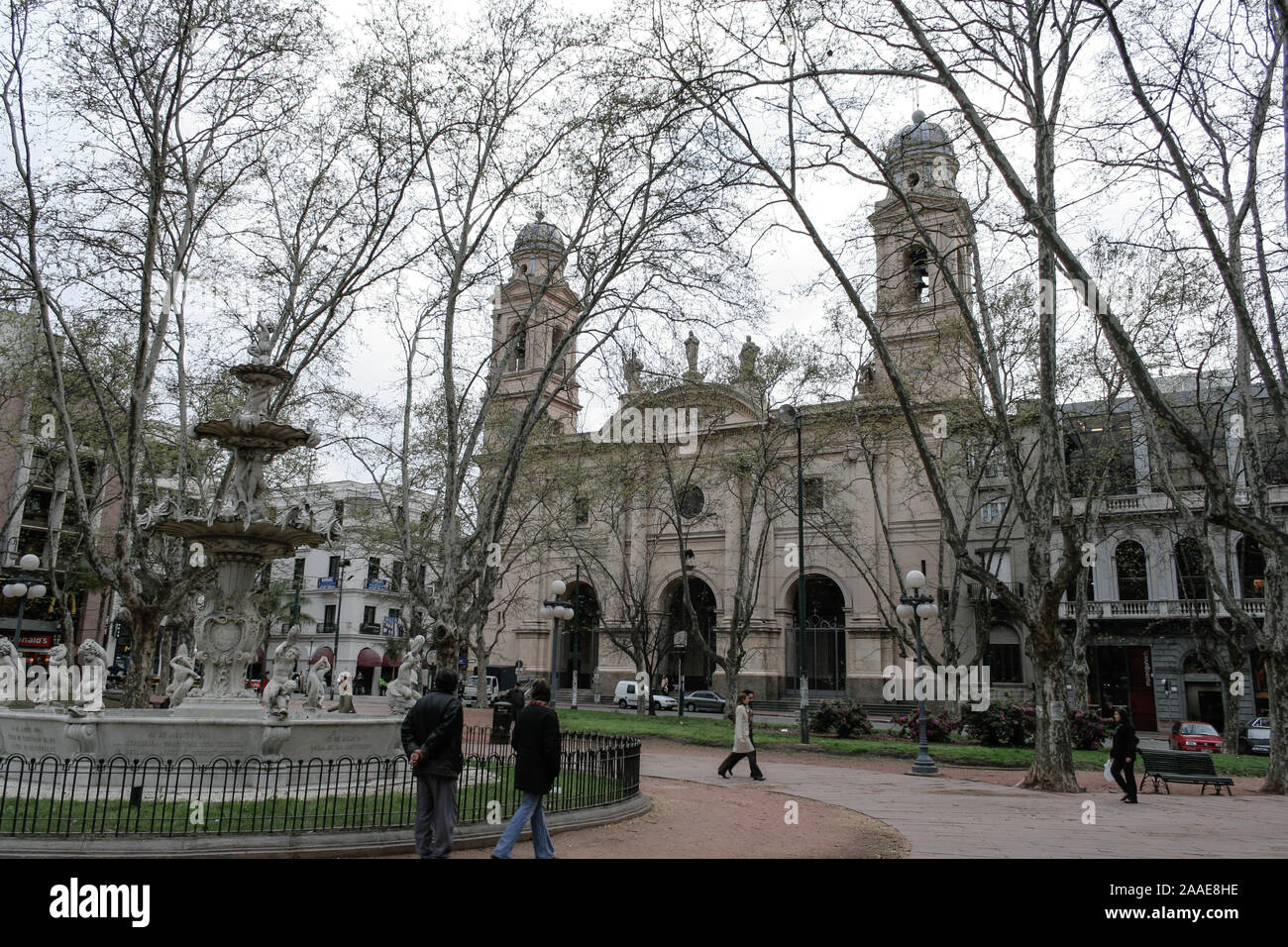 Montevideo, Uruguay. 19 September, 2007. People walk pass bare trees at ...
